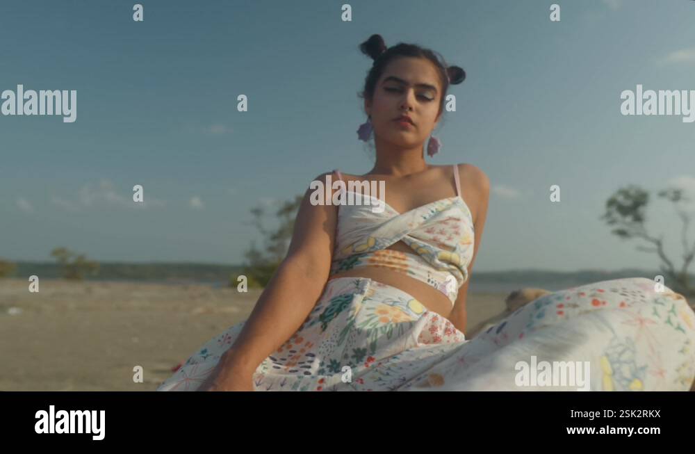 young adult lady female hipster gen z teen girl serious face with knot ...