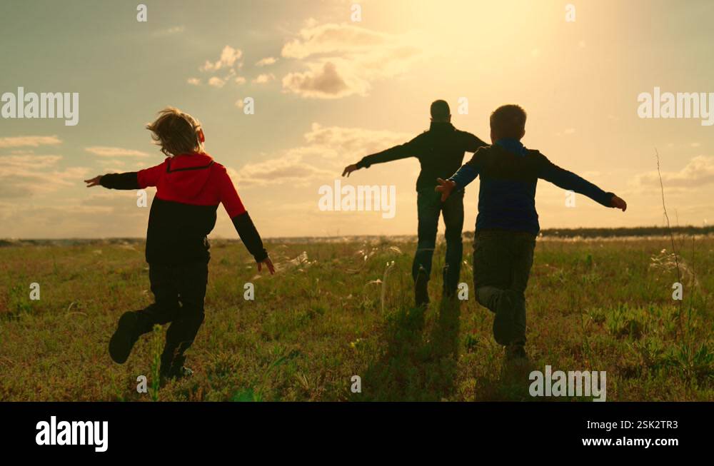 Childhood dream concept. Childrens outdoor game. Child boy run in ...