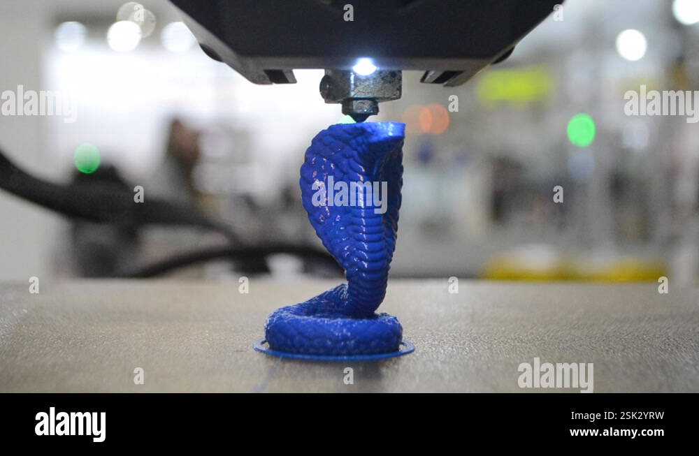 3D printer printing close-up Process creating three-dimensional model ...