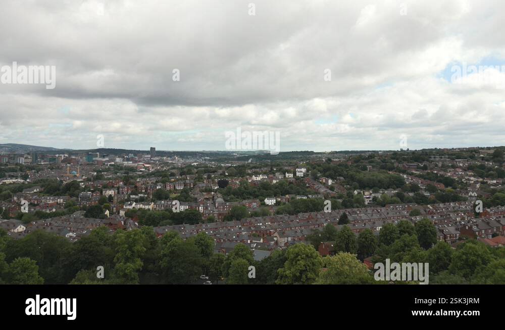 Drone footage from park over trees revealing Sheffield suburbs Stock ...
