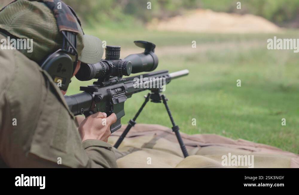 Slow motion of soldier during training with sniper caliber 7.62 mm at ...