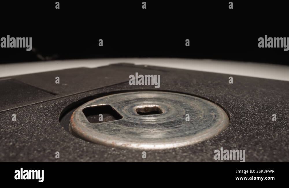 Floppy disk designed to watch eclipses on black background Stock Video ...