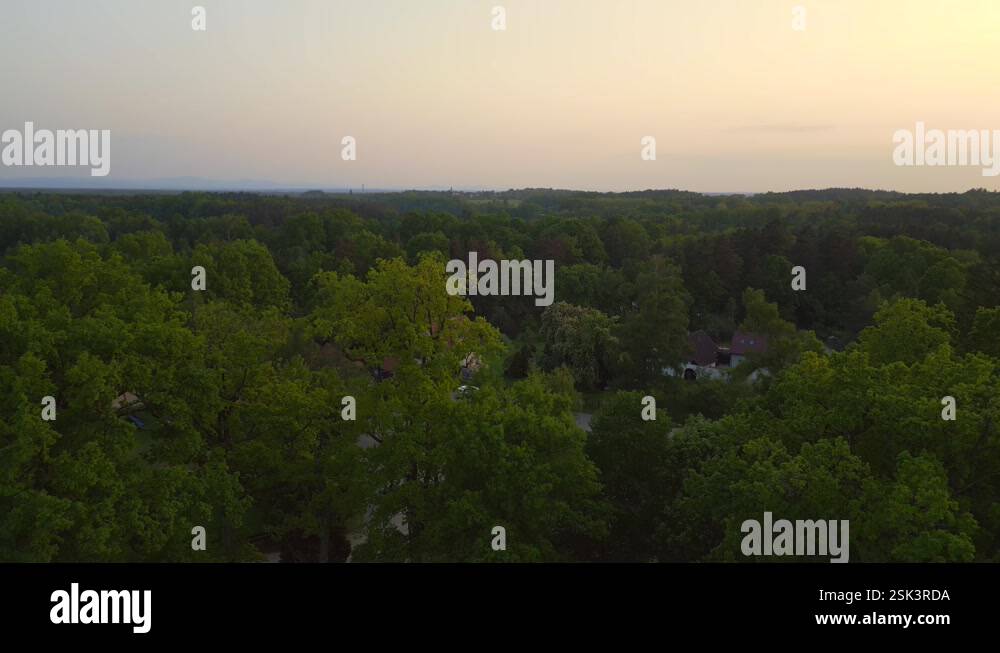 evening sunset village Stankov at potok lake. Nice aerial top view ...