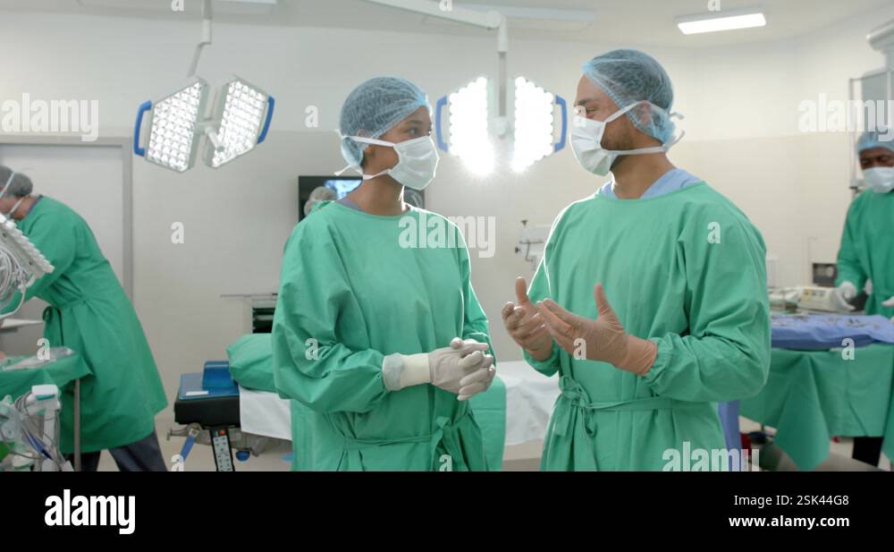 Diverse surgeons wearing surgical gowns Stock Videos & Footage - HD and ...