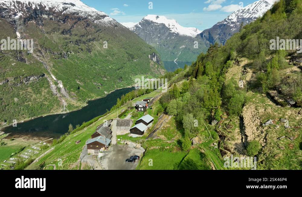 Stunning Geiranger fjord reveal from steep hillside and local farm ...