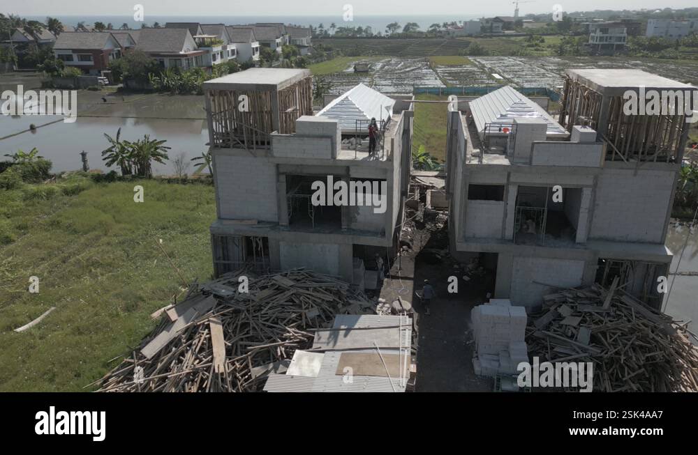 Large cinder block homes being built by rice fields of Cemagi, Bali ...