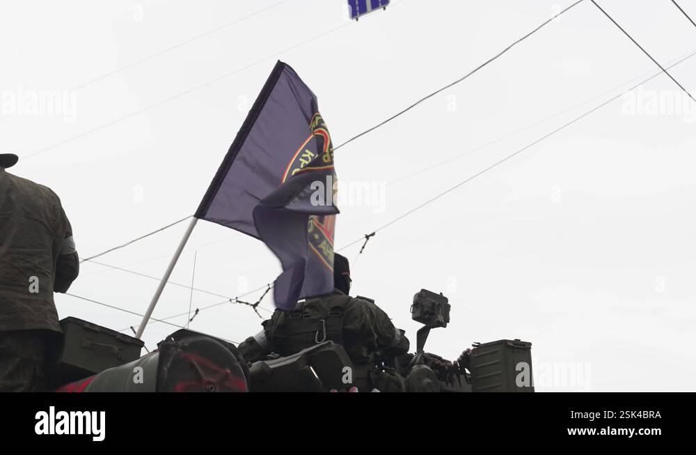 flag of PMC Wagner on the streets of the city. military coup in Russia ...