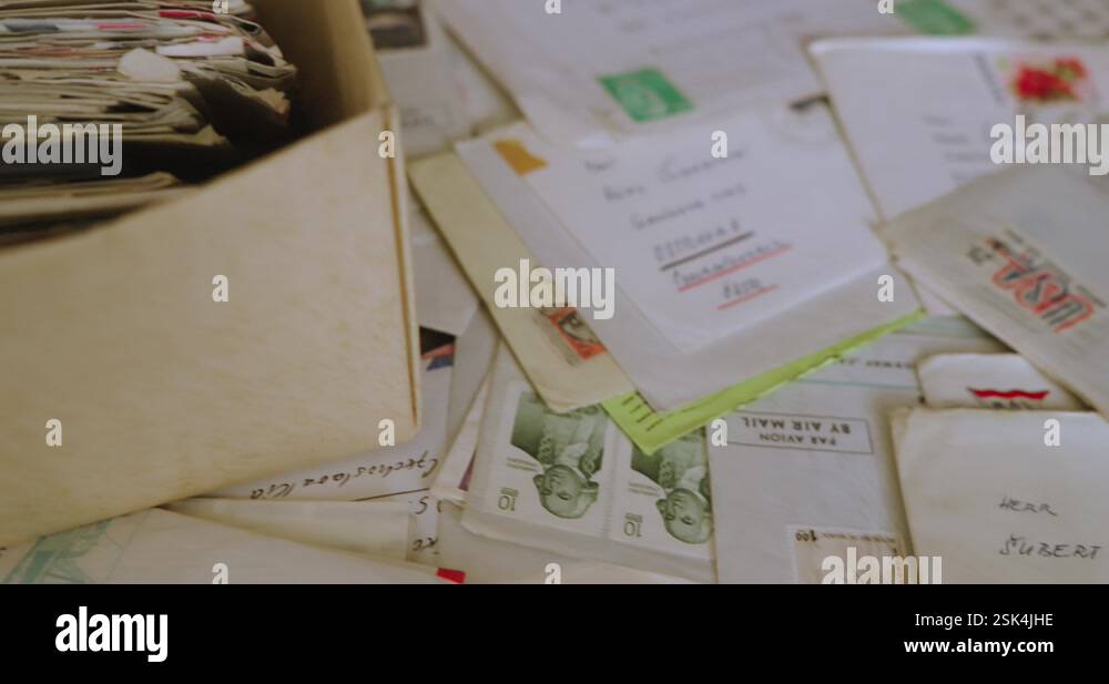 Letters spread around a box with other letter envelopes Stock Video ...