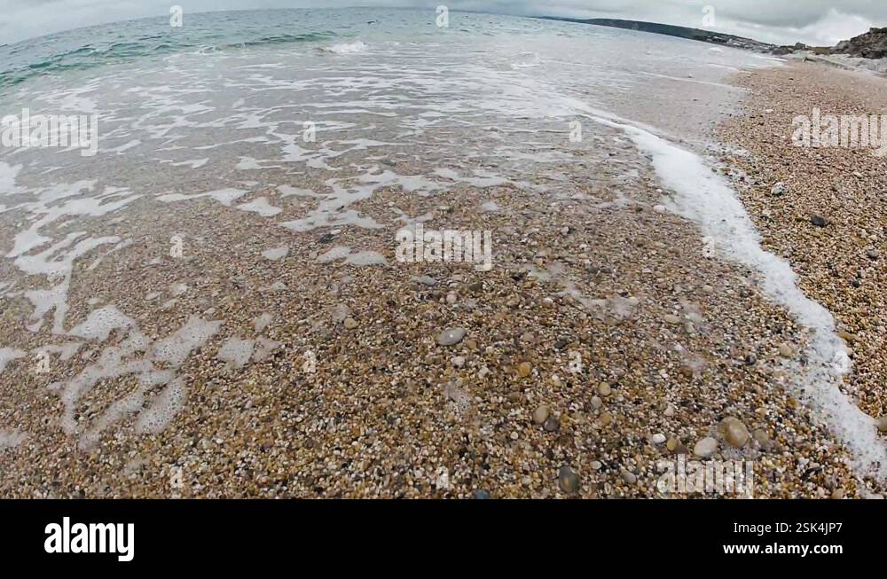 Sea Water Gently Receding as New Wave Begins to Break - Ultra Slow ...