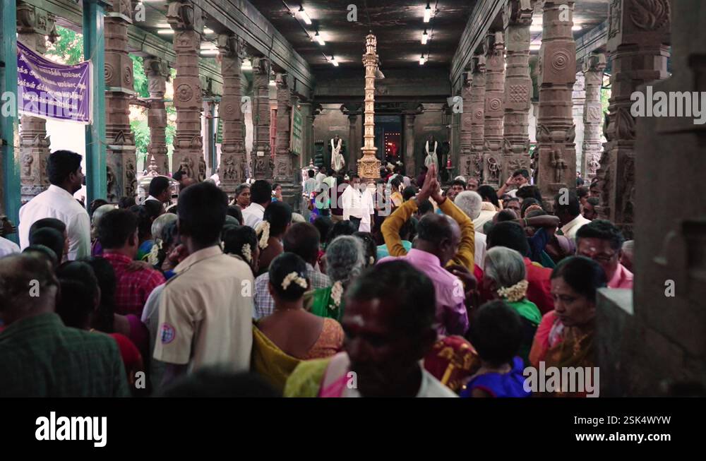 Indian Hindu Devotees Praying at a Temple. Crowd Of People Make A Pray ...