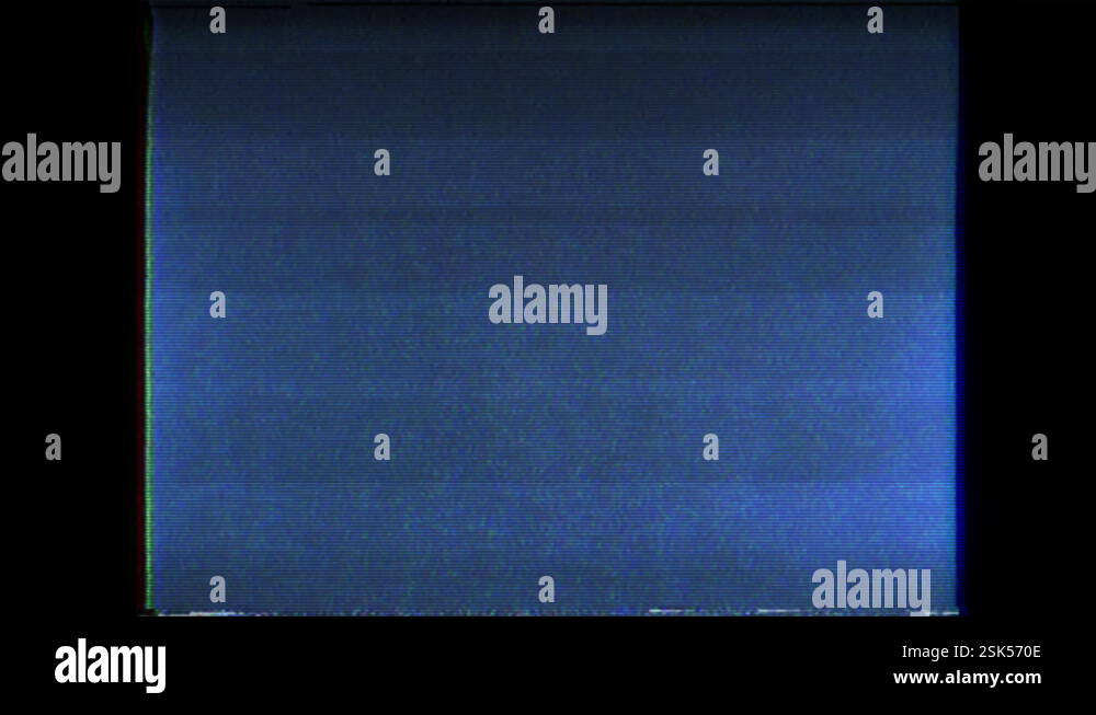 A television screen with VHS effect of digital pixelated noise ...