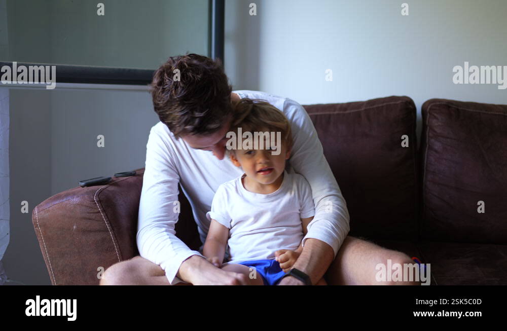 Authentic Father and son relationship. Fatherhood playful parenting interac Stock Video Footage ...