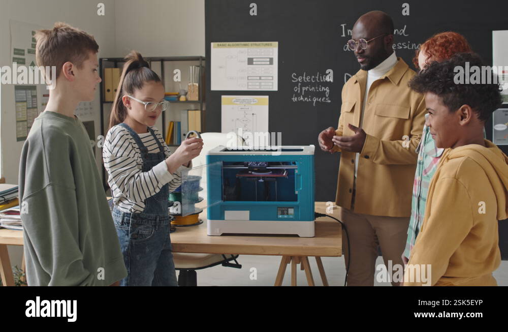 School Kids Learning about 3D Printer Details from Teacher Stock Video ...