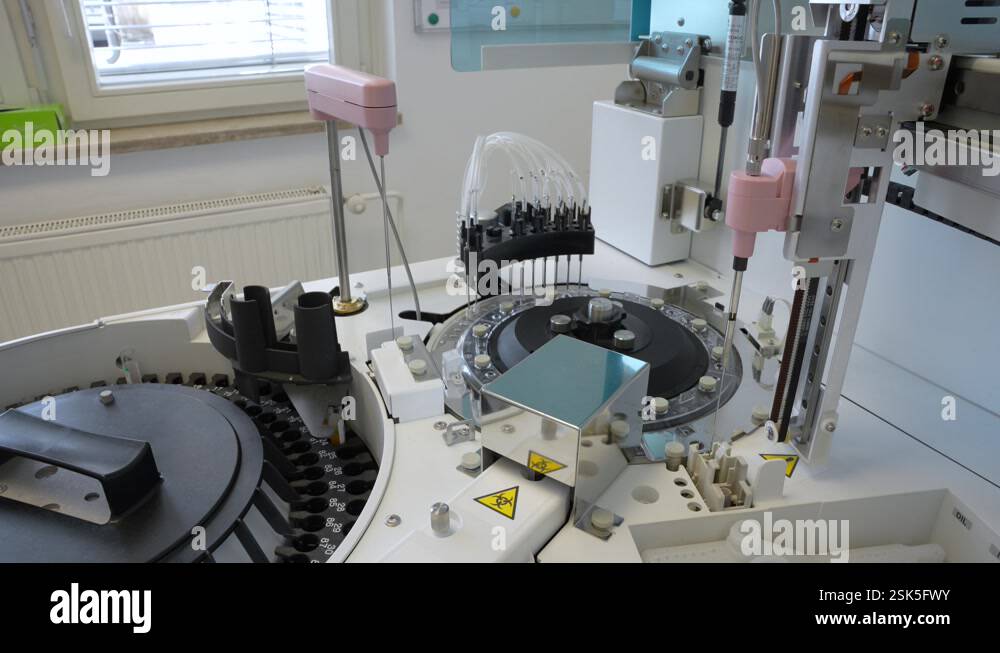 Blood samples with barcode slowly rotating and being scanned with ...