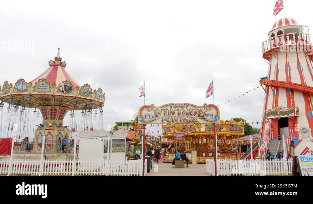 British vintage fun fair: carousel rides, ferris wheels, nostalgic ...