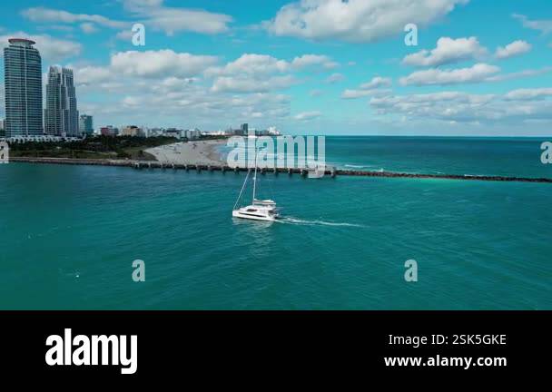 Catamaran at sea of Miami beach. Summer vacation. Miami aerial view ...