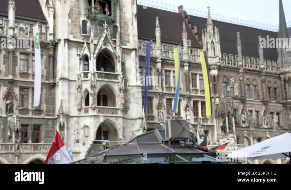 Slow Motion Pan Up Looking Up At Famous Clock Tower in Marienplatz in ...