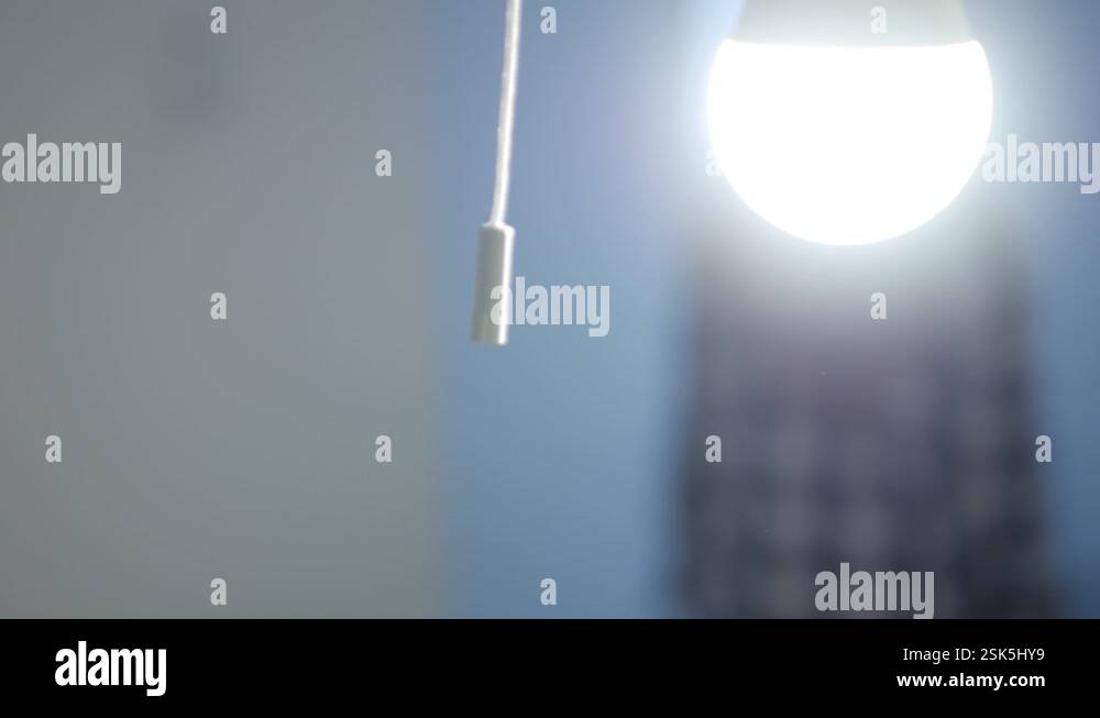 Turning the Light On a Led Bulb, Turn On the Light in a Dark Room, Girl ...
