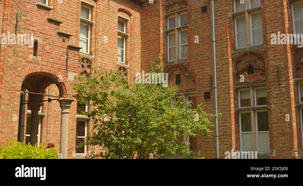 Pan Shot of Europe's Oldest Hospital Building, Old St. John's Hospital ...