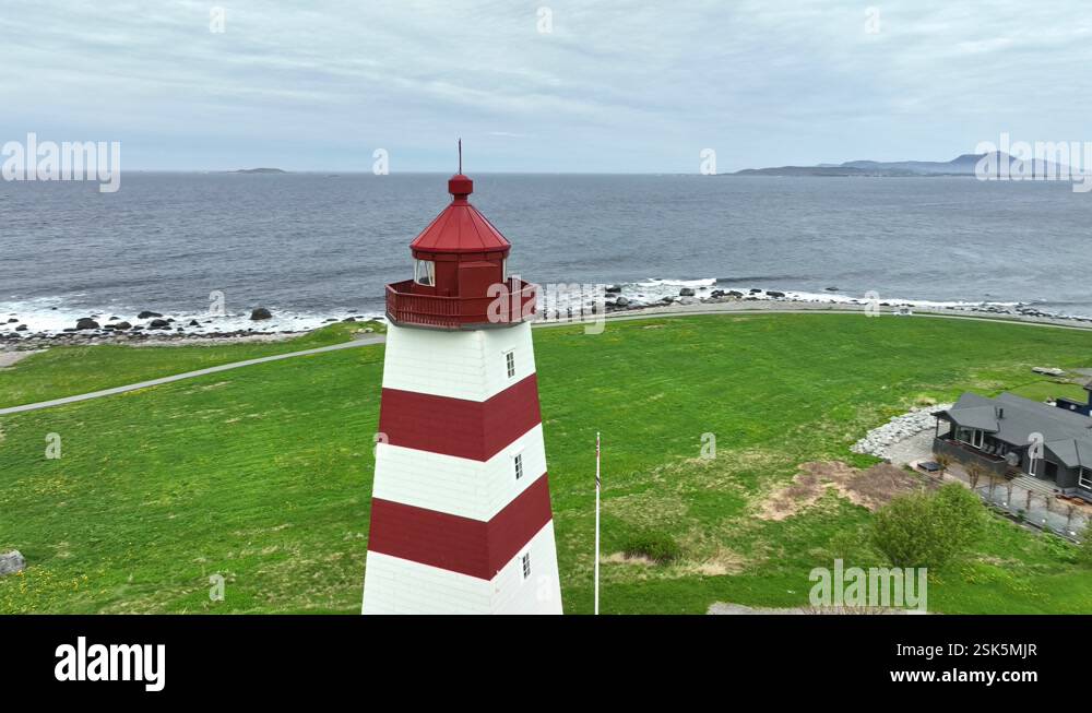 Alnes lighthouse outside Alesund Norway - Flying and rotating closely ...