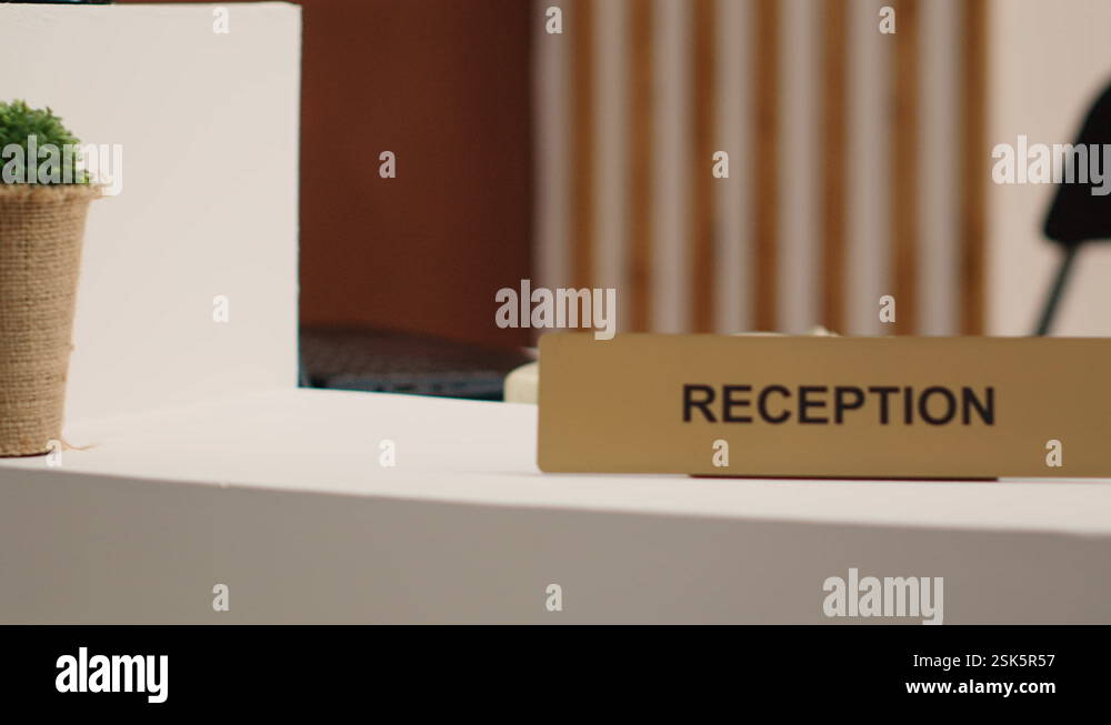 Resort foyer check in reception sign Stock Video Footage - Alamy