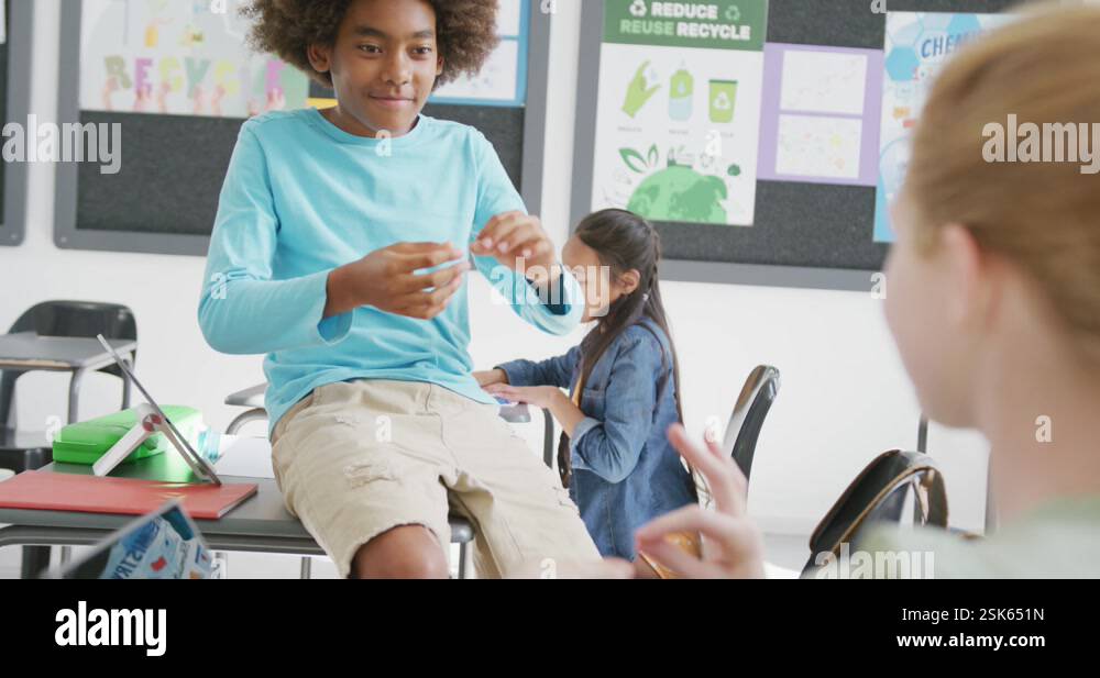 Video of diverse schoolboy and schoolgirl using sign language in ...