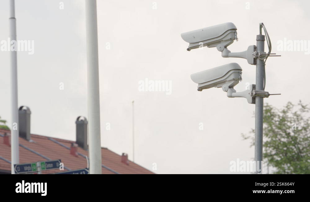 Static shot of CCTV security cameras used for perimeter surveillance ...