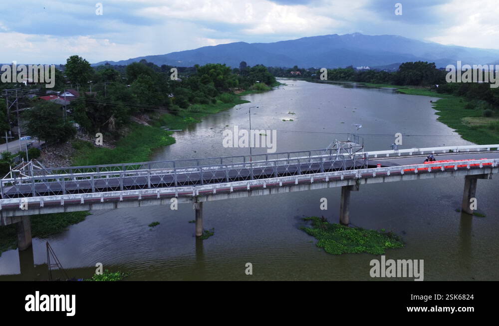 Repair of a concrete bridge across a river in the countryside. Repair ...