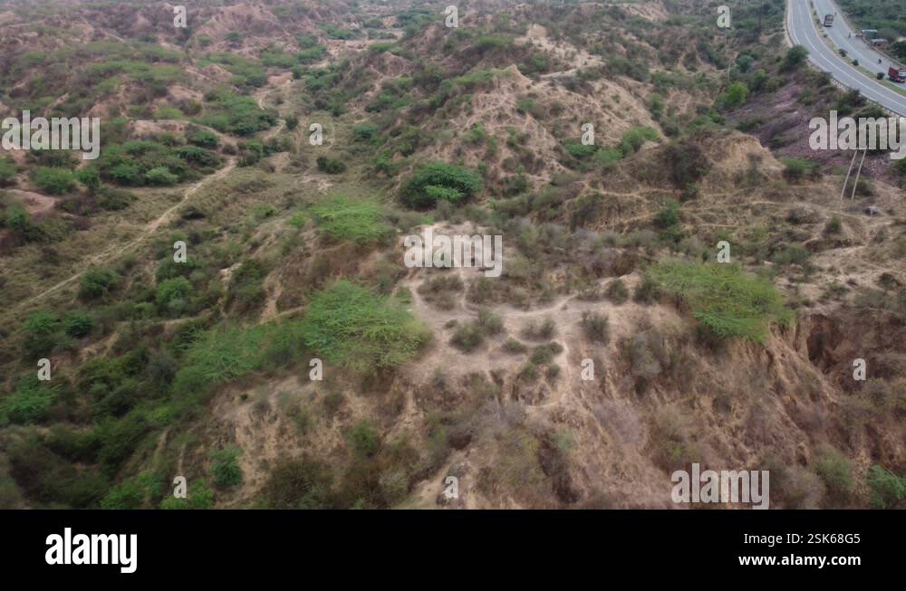 Unique gully erosions of the iconic badlands of Chambal ravines next to ...