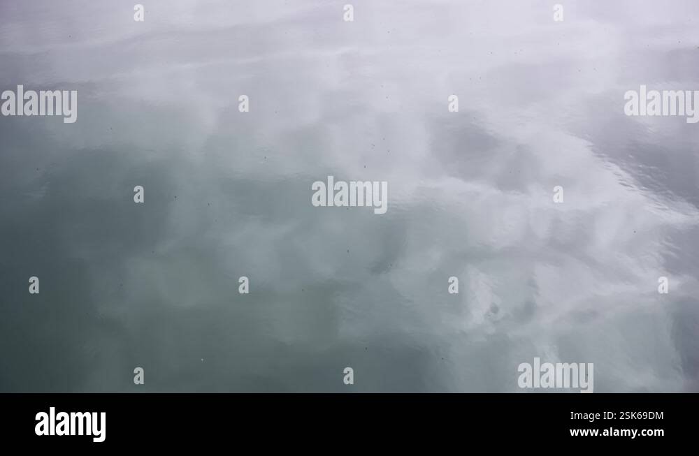 Close-up, clean river water flows. Beautiful blue clear water of lake ...