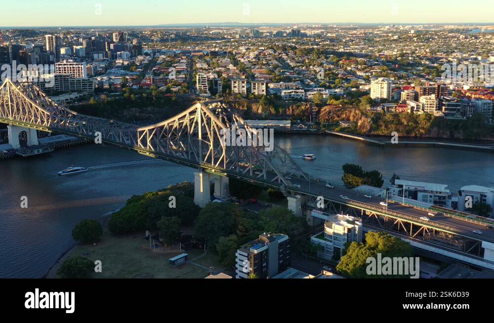 Cinematic drone flyover and around the iconic landmark of Brisbane city ...