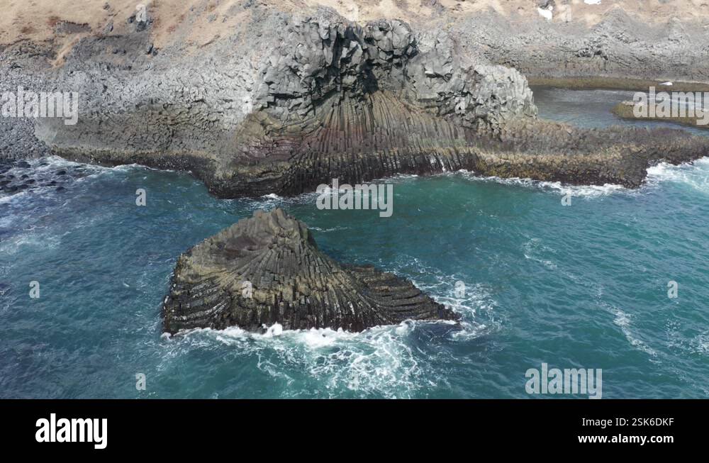 volcanic rock cliffs and basalt columns Stock Video Footage - Alamy
