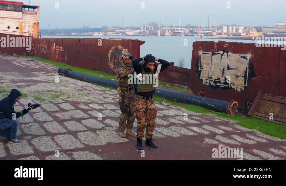 videographer captures scene of soldier catching kneeling terrorist ...