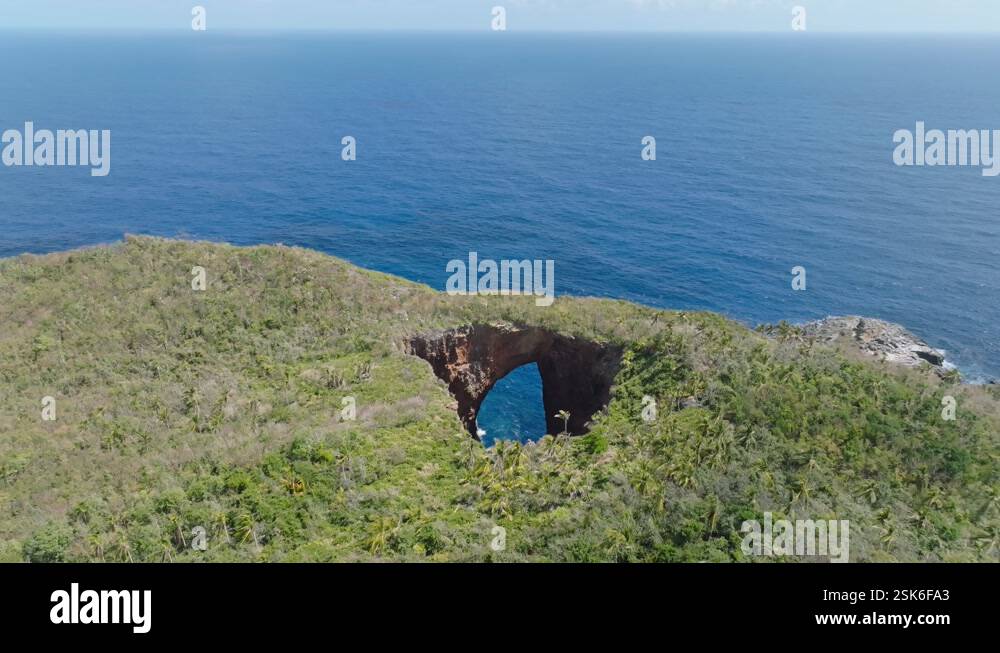 Drone flight over Cabo Cabron Nationalpark with arch and blue ocean ...