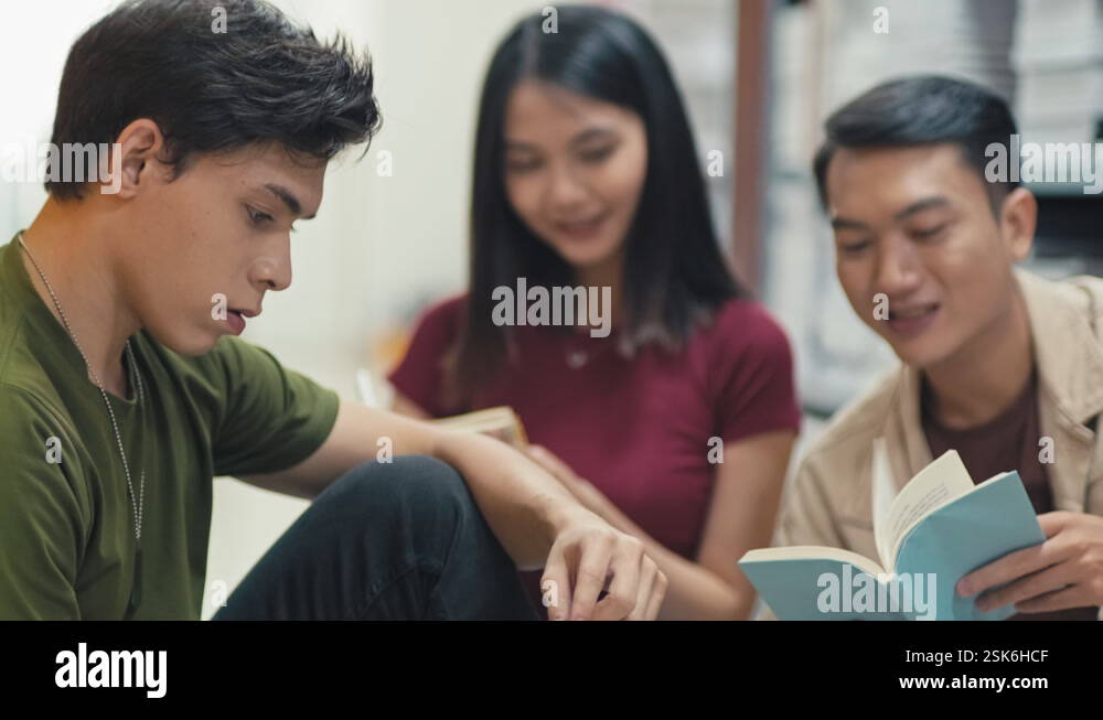 Groupmates Reading Books Together while Preparing for School Project ...