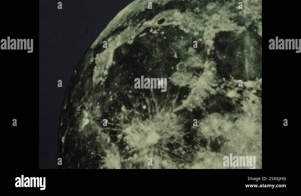 1960s: photo of the moon showing impact craters and lighter-colored ...