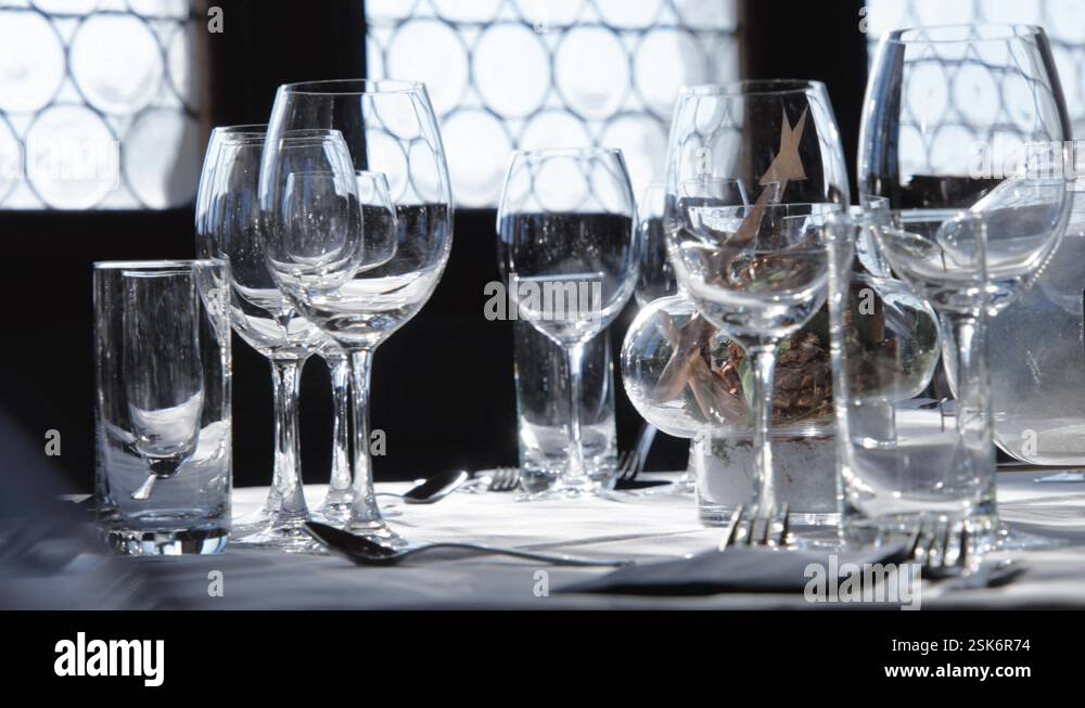 Sliding Pan of Empty Wine and Drinking Glasses on Fine Dining Table ...