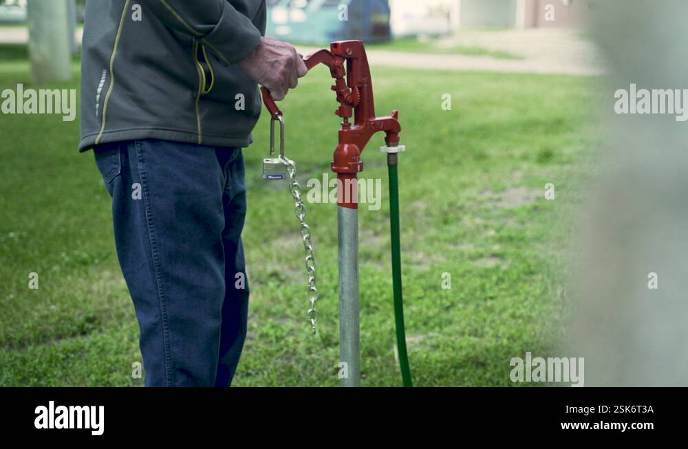 Man pumping water Stock Videos & Footage - HD and 4K Video Clips - Alamy