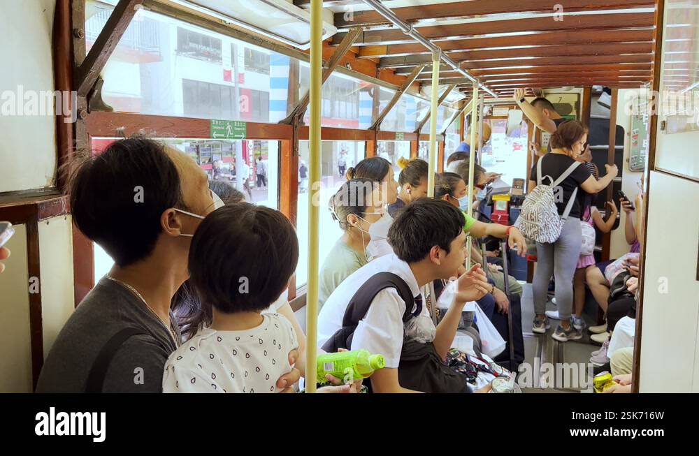 Crowded Tram Journey Through the City Streets of Hong Kong Stock Video ...