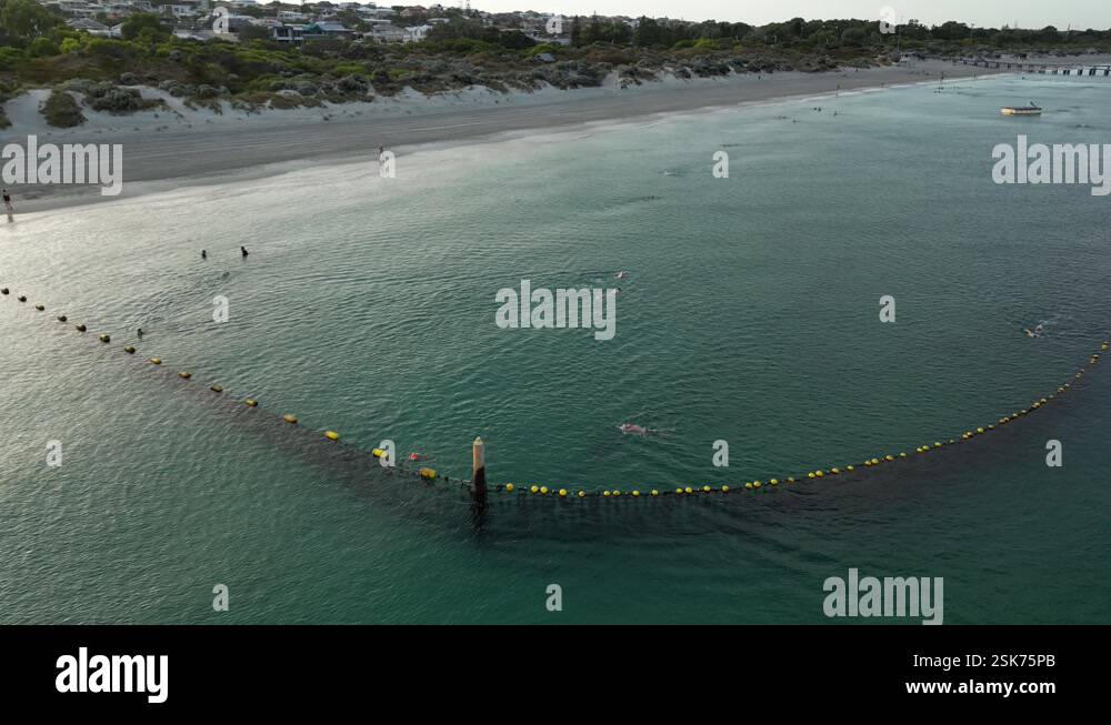 Row of Buoys separate ocean zone for swimmer, protecting against sharks ...