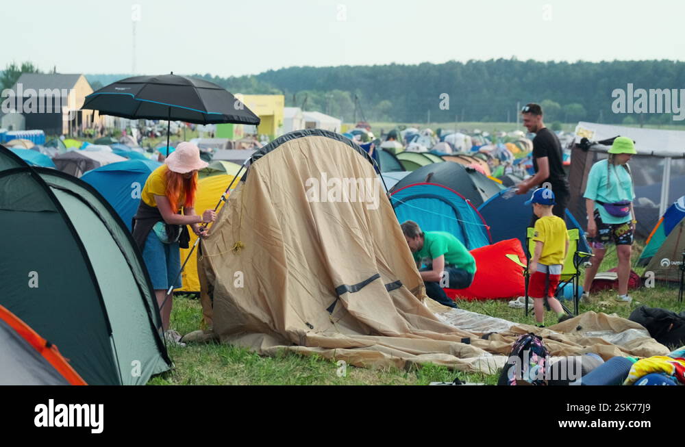 Family setting up tent during camping in countryside Stock Video ...