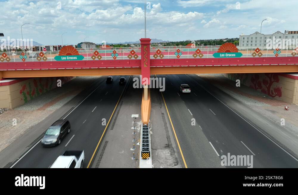 Las Cruces signs on overpass bridge. Aerial establishing shot of Las ...