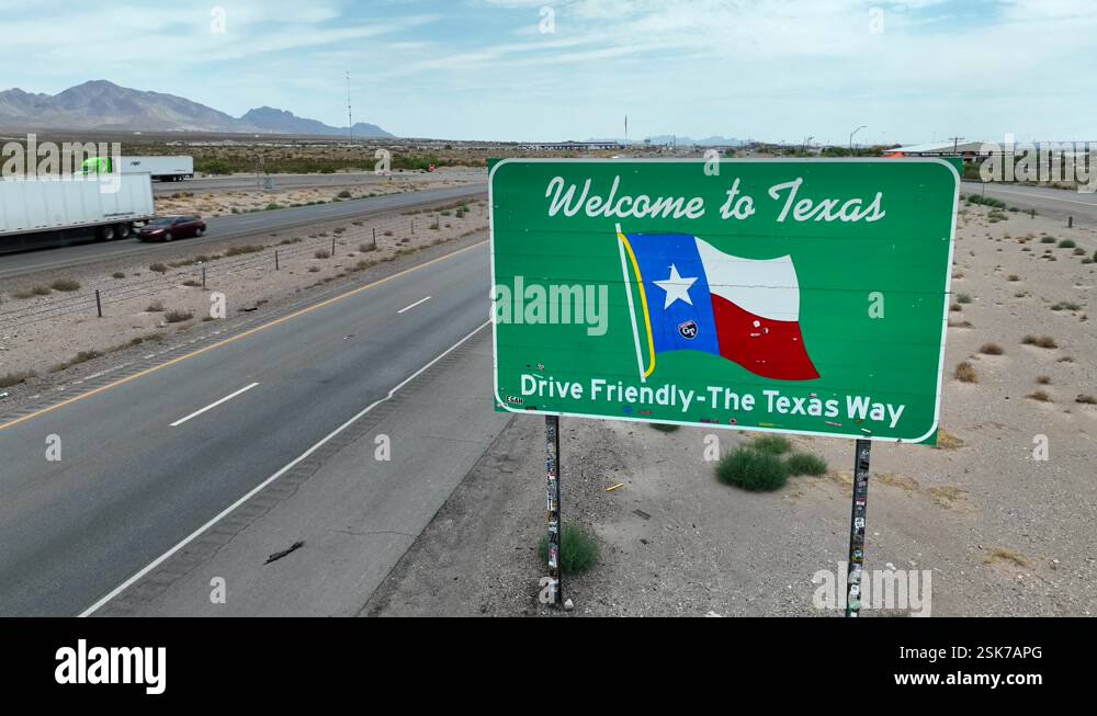 Welcome to Texas state road sign. Aerial establishing shot of TX sign ...