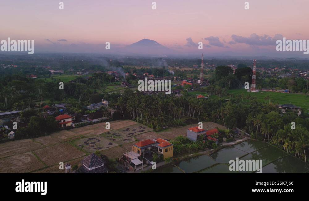 pink's sunset with the volcano Mount Agung in the background - Ubud ...