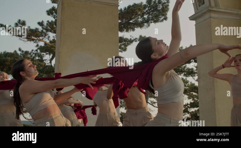 Professional dancing group performing an interpretive dance in a temple ...