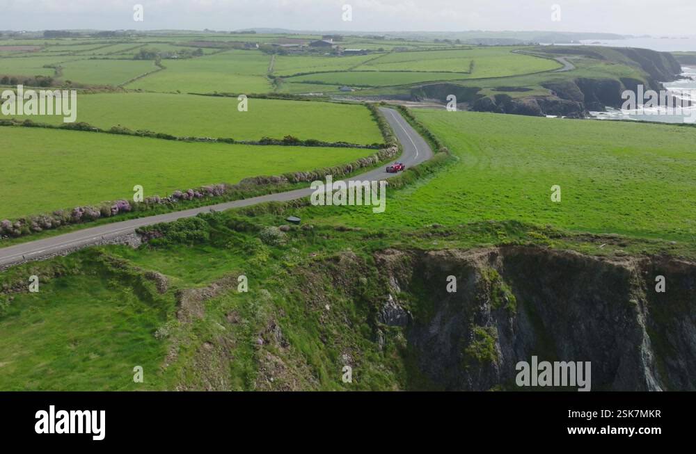 Vintage car on an event on the scenic coastal Copper Coast Drive ...