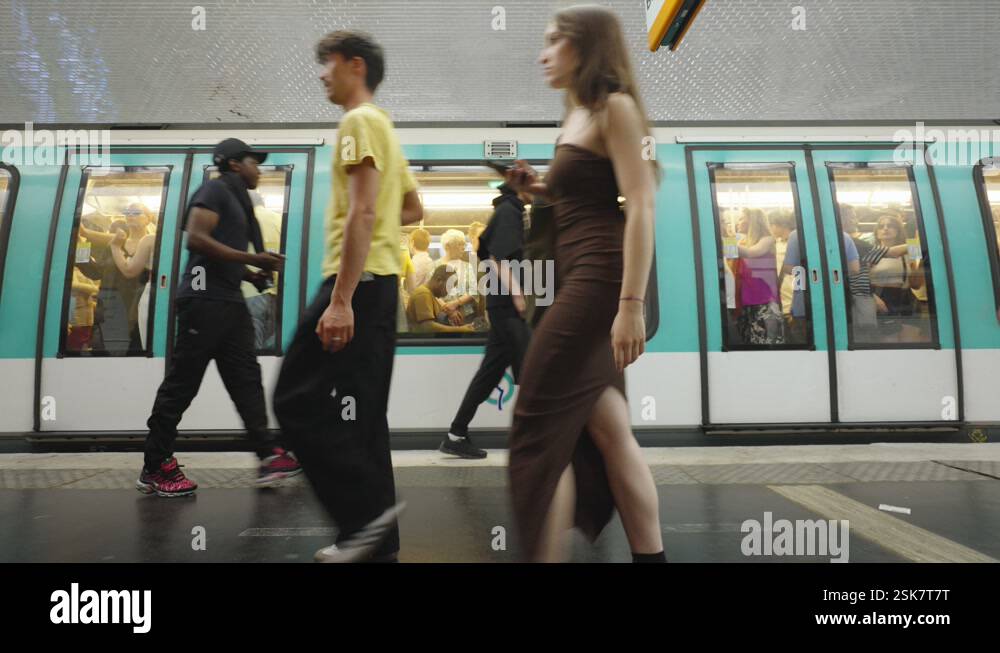 Paris, France. June 25 2023. People board crowded trains in the metro ...
