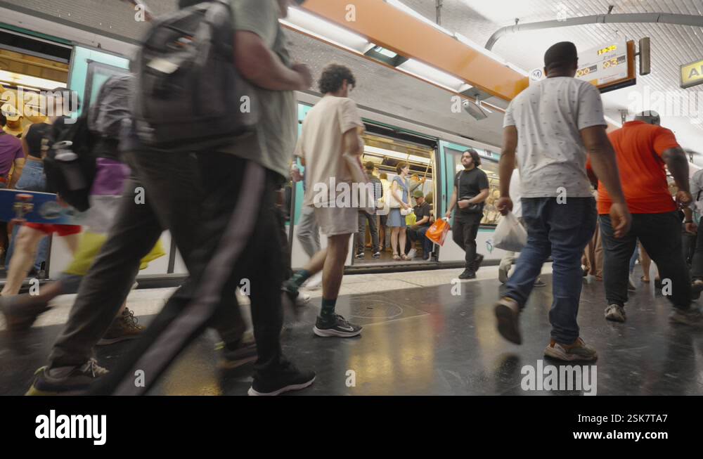Paris, France. June 25 2023. People board crowded trains in the metro ...