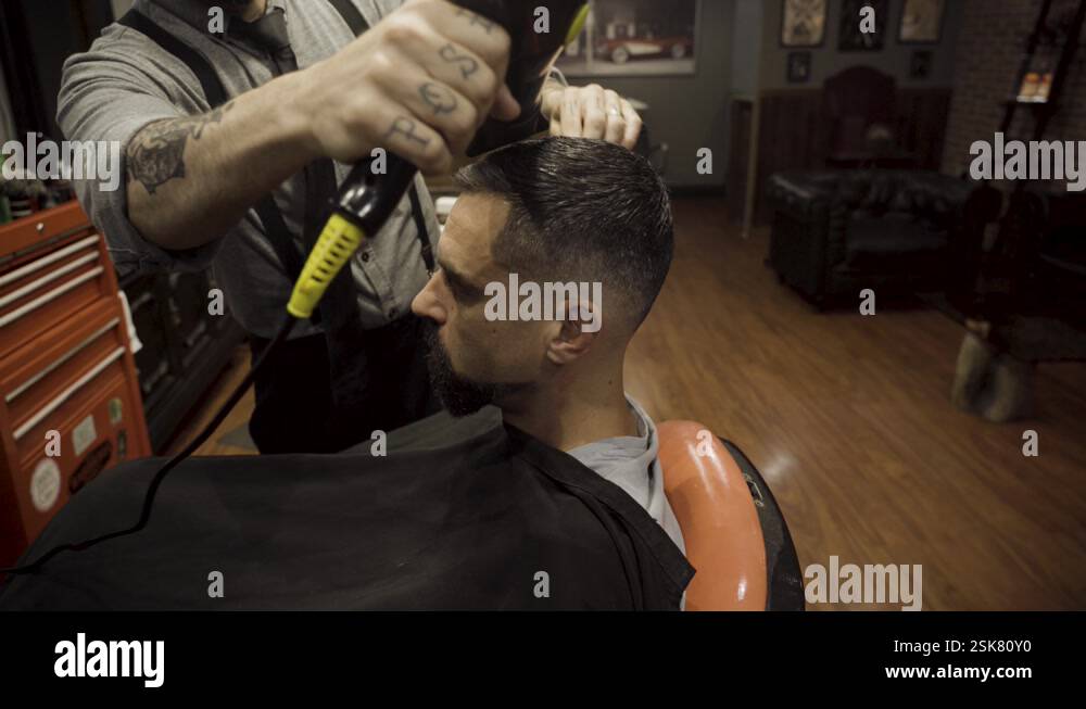 Barber Using Hair Dryer Machine On Man's Hair - close up Stock Video ...