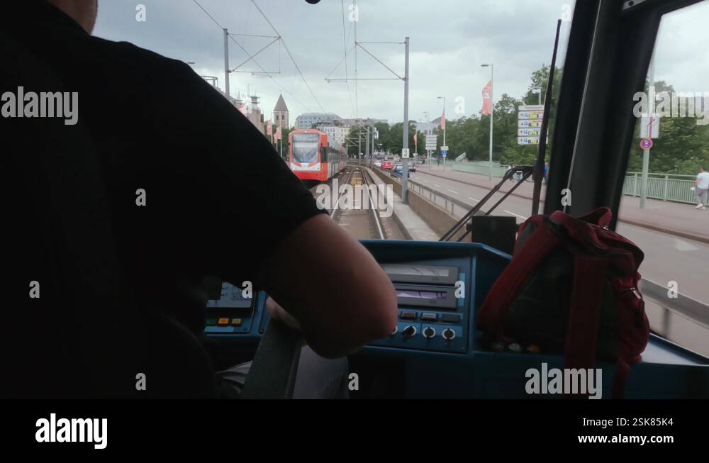 Subway train with cockpit interior and operator driver sitting and ...